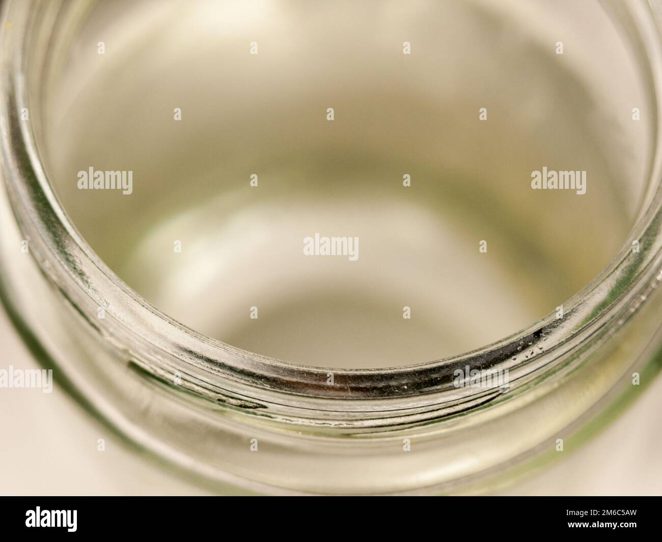 The rim of a glass jar up close clear and shining Stock Photo - Alamy