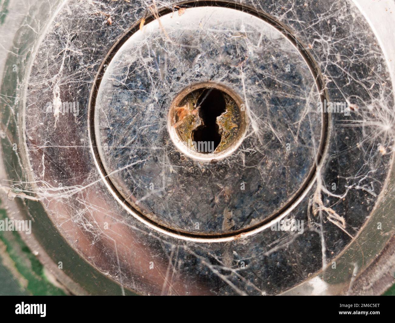 A silver metal key hole up close locked for graphic design Stock Photo ...