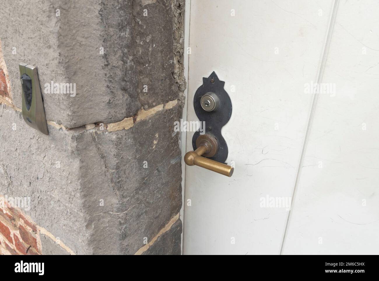 New installation of the door lock to the ancient building style of old ...