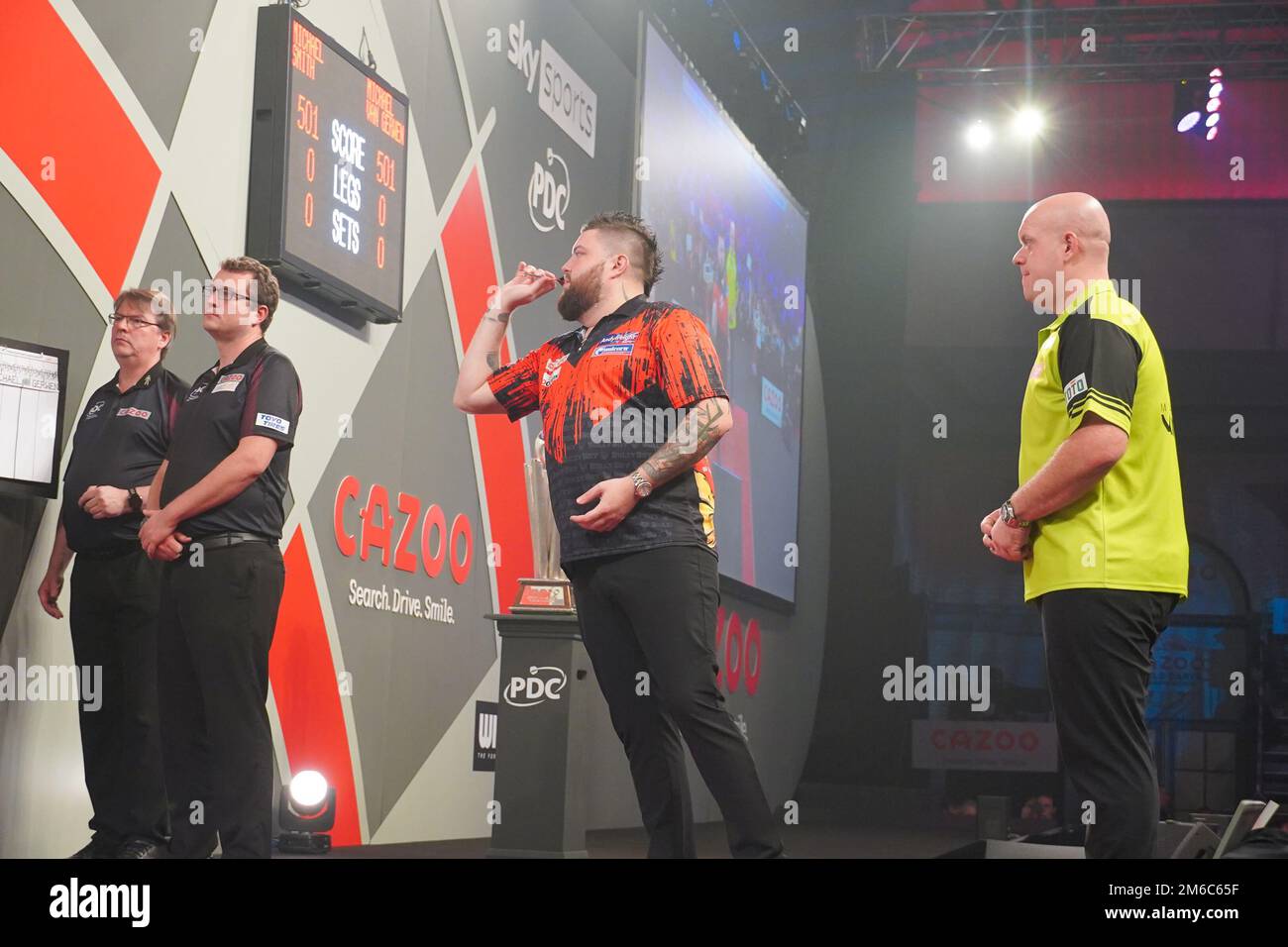 LONDON, UNITED KINGDOM - JANUARY 3: Michael Smith of England and Michael van Gerwen of the ...