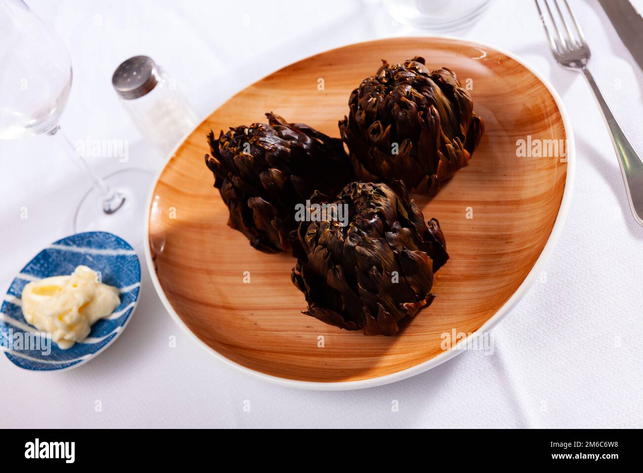 Appetizing dish of artichokes Stock Photo - Alamy