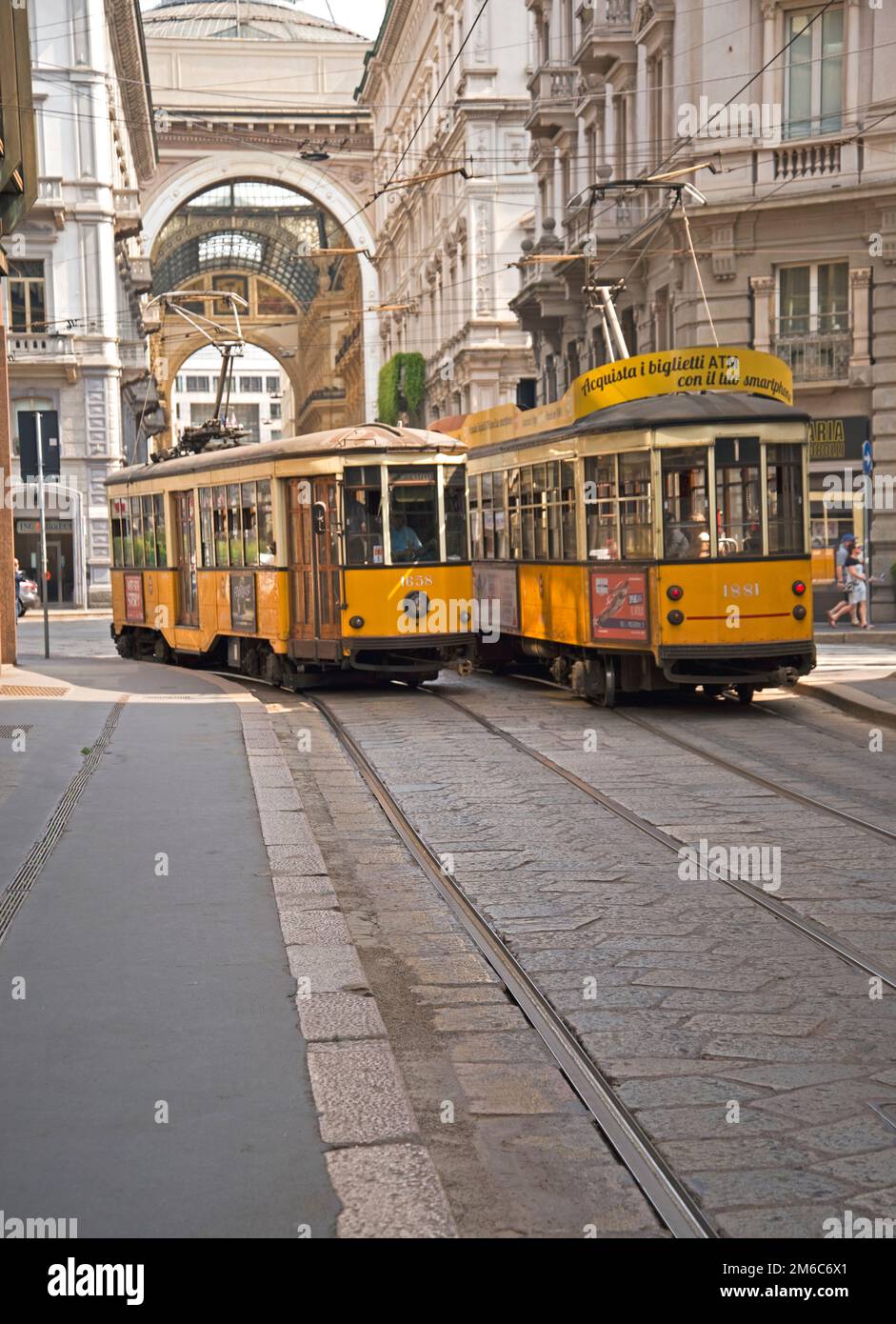 Two historic trams meet in the centre of Milan Stock Photo - Alamy