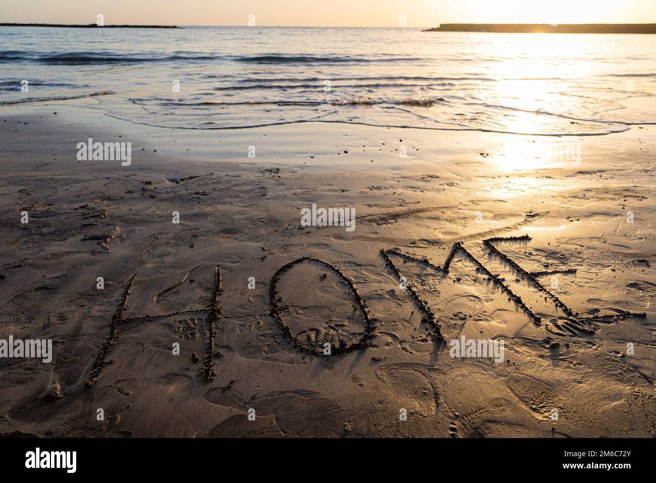 "Home" written on the beach, photo with copy space Stock Photo - Alamy