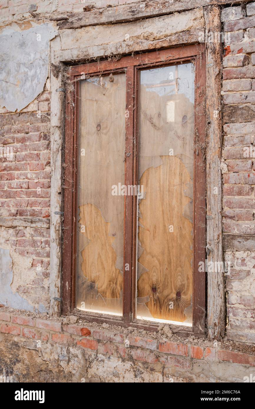 Fragment with a window of an old building before demolition Stock Photo ...