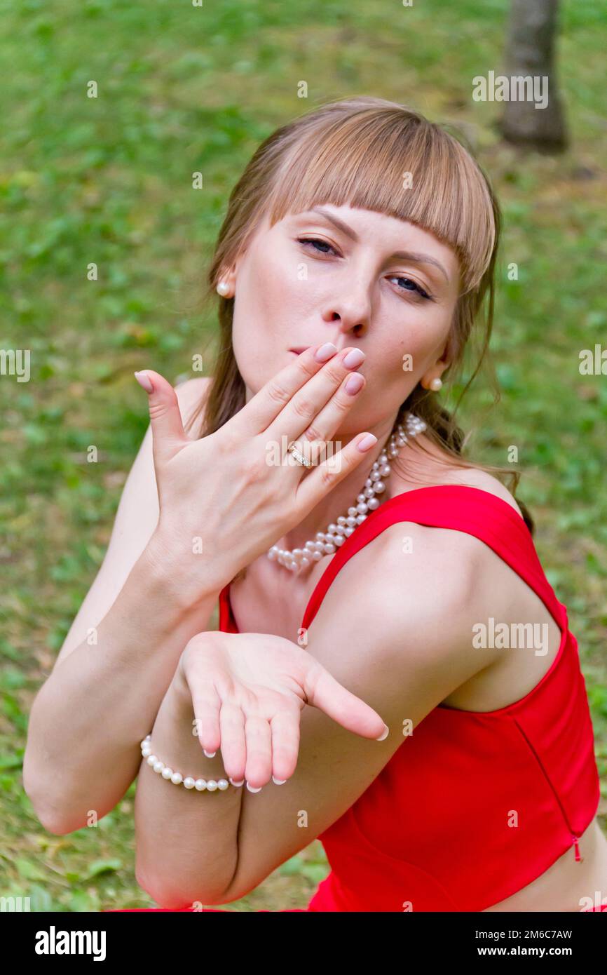 Beautiful lady in red Stock Photo - Alamy