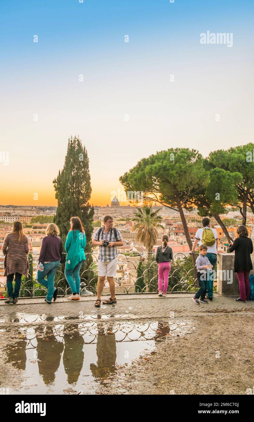 Tourists at villa borghese gardens, view from pincian hill with st ...