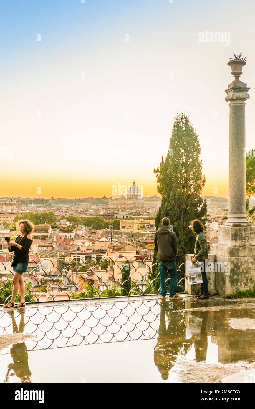 Tourists at villa borghese gardens, view from pincian hill with st ...