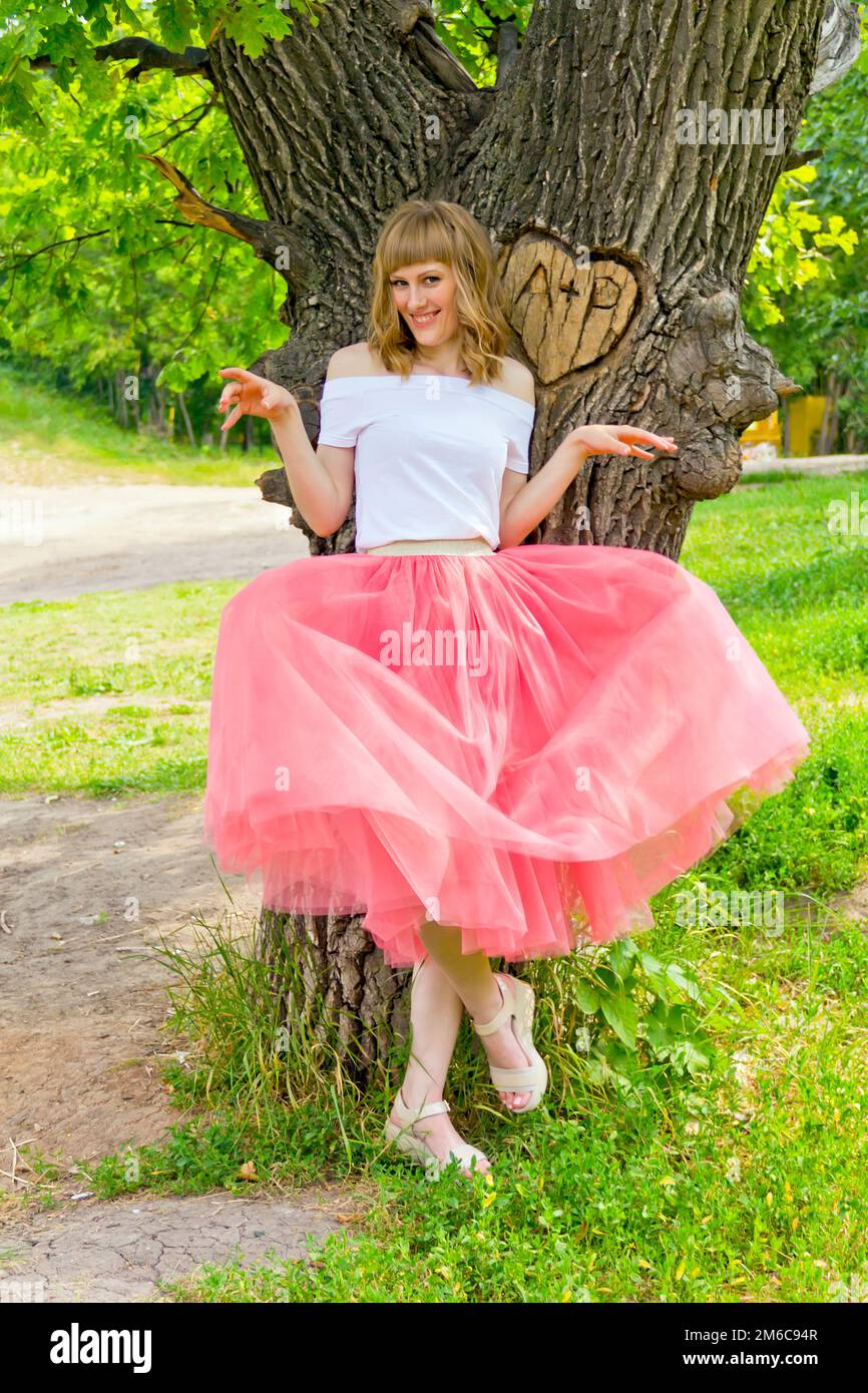 Beautiful lady in pink Stock Photo - Alamy