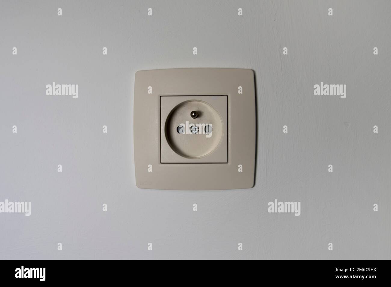Standard socket in a house with a touch of dirt after long use Stock ...