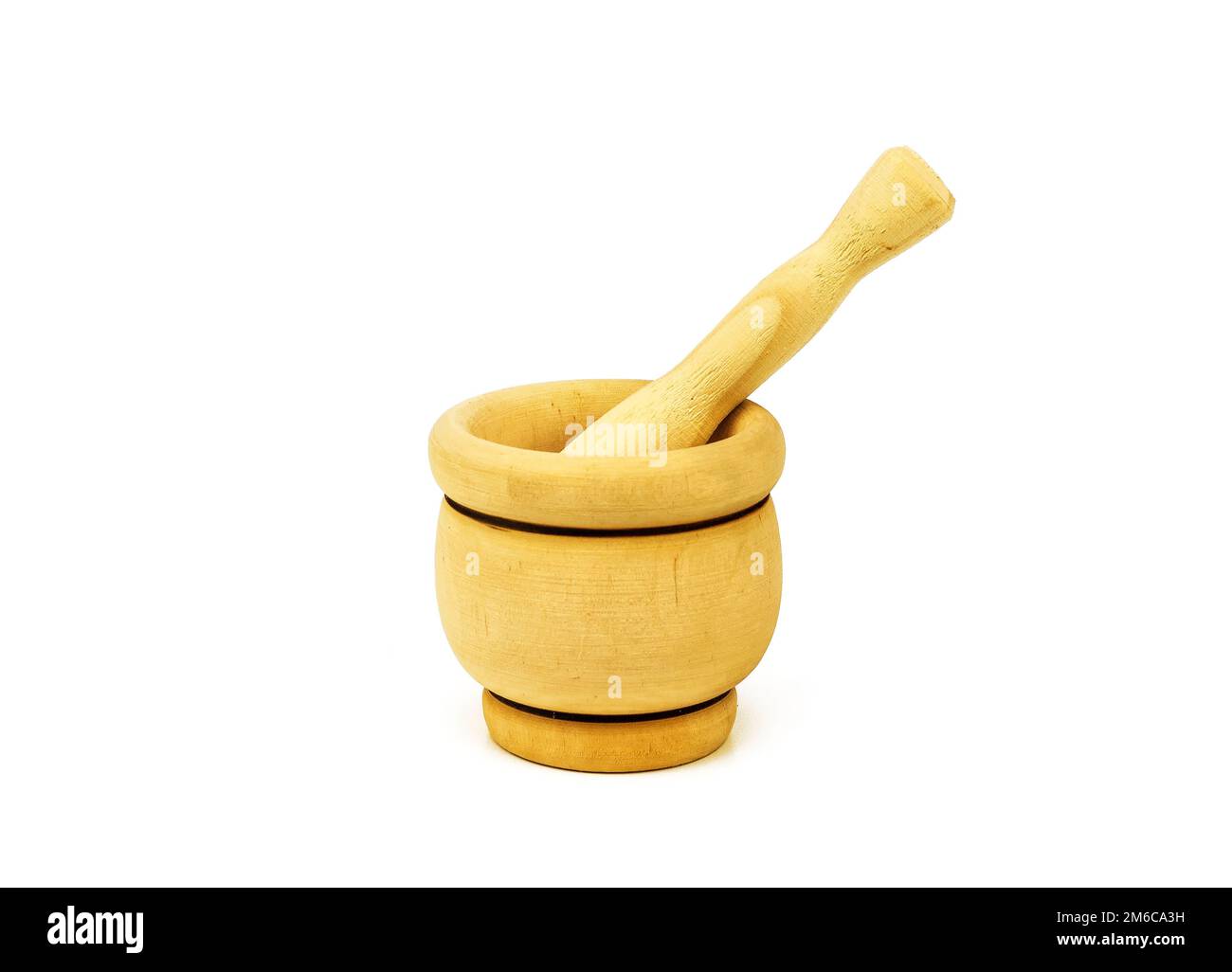 On a white background a wooden mortar for grinding various culinary ...