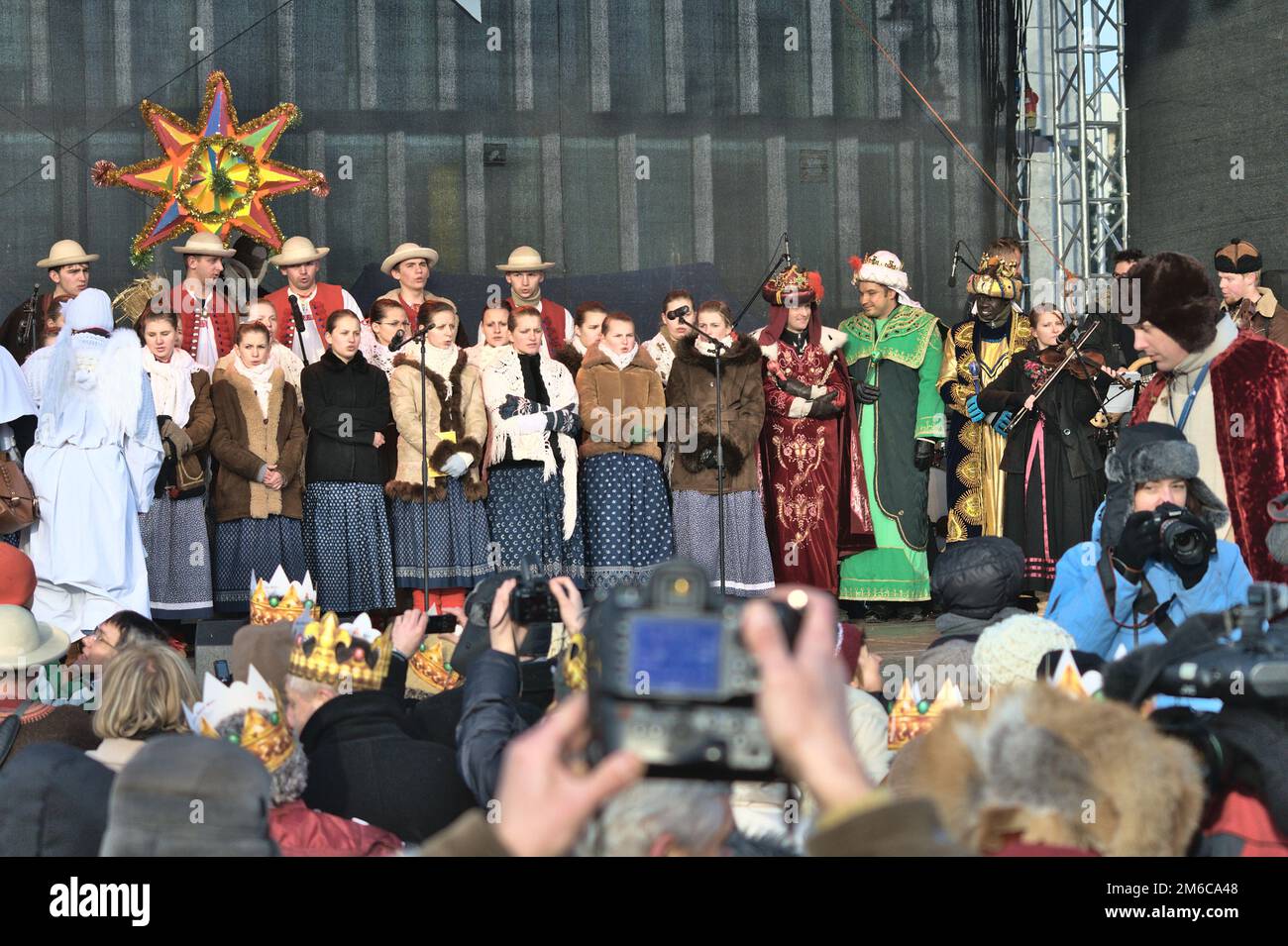 Singing Christmas carols to celebrate the annual Three Kings Day Parade ...