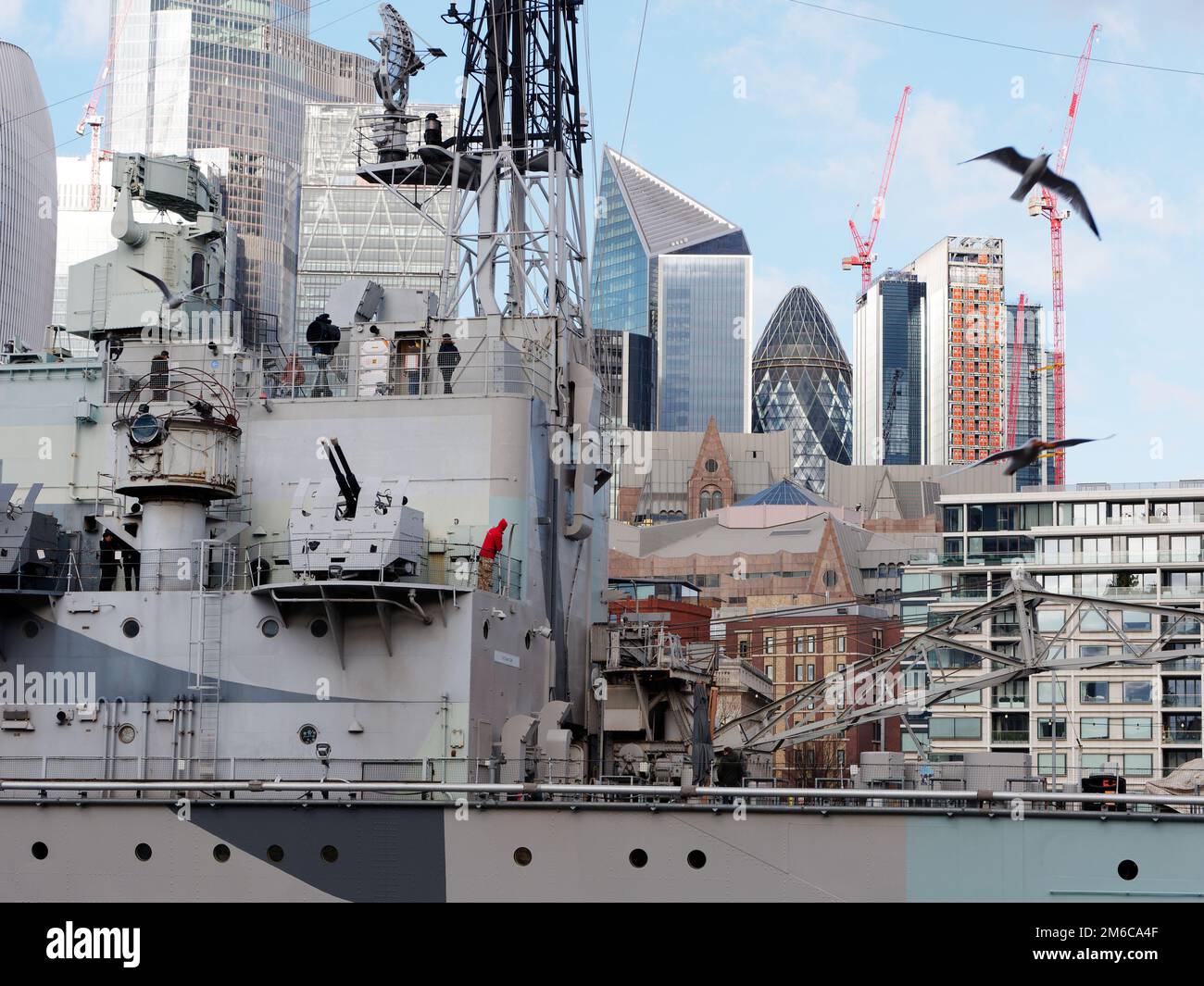Close up of HMS Belfast ship, a museum piece docked on the River Thames ...