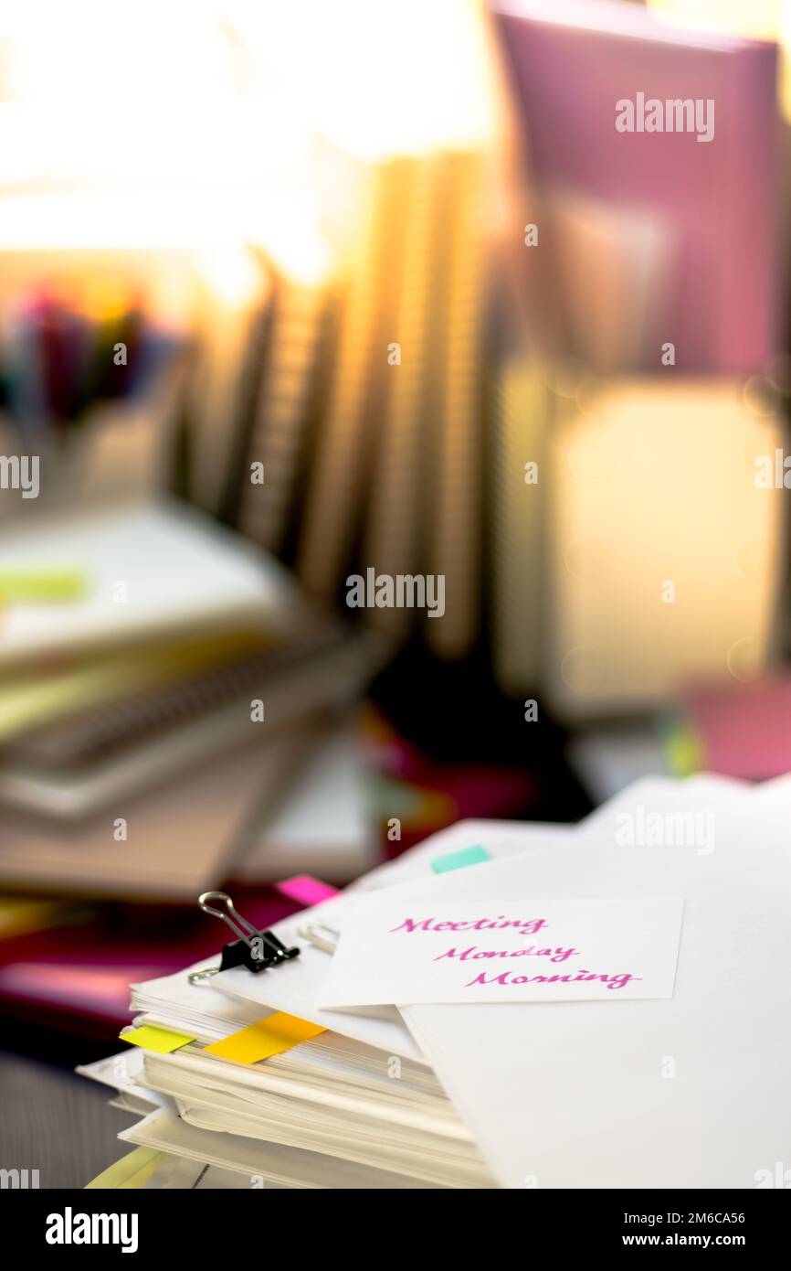 Meeting Monday Morning; Stack of Documents. Working or Studying at ...