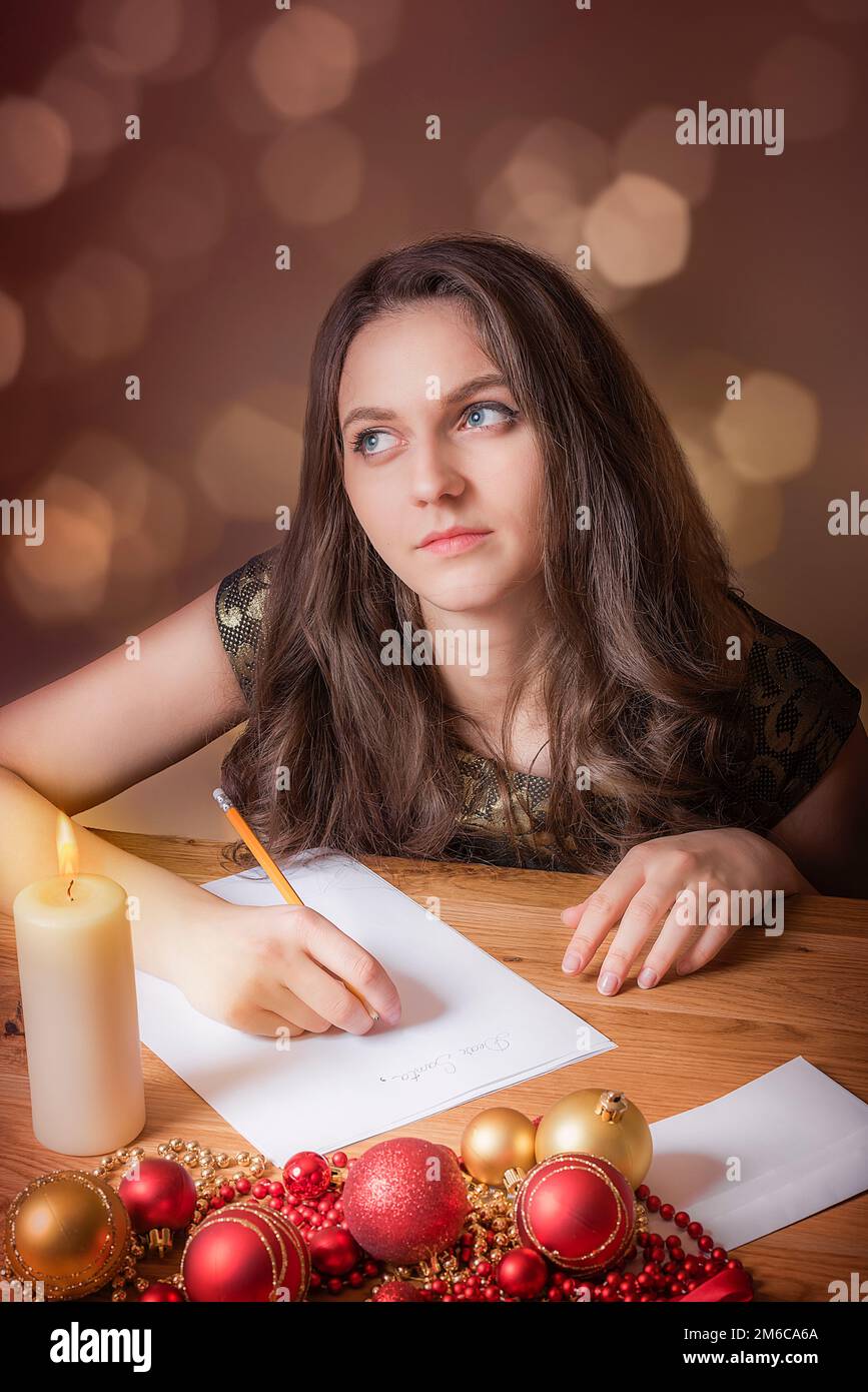 Woman thinking writing hi-res stock photography and images - Alamy