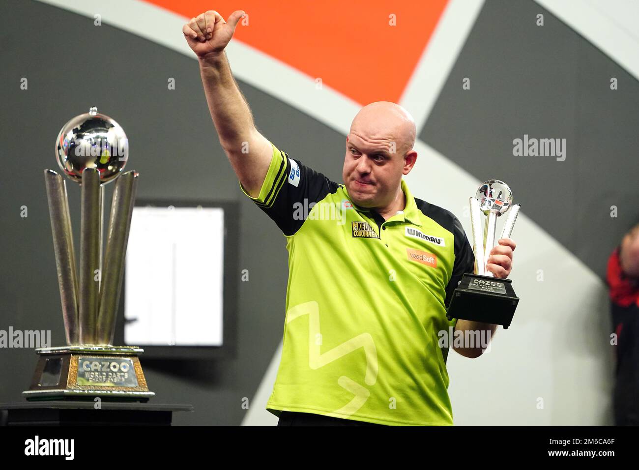 Michael van Gerwen applauds the fans after losing against Michael Smith in the final of the ...