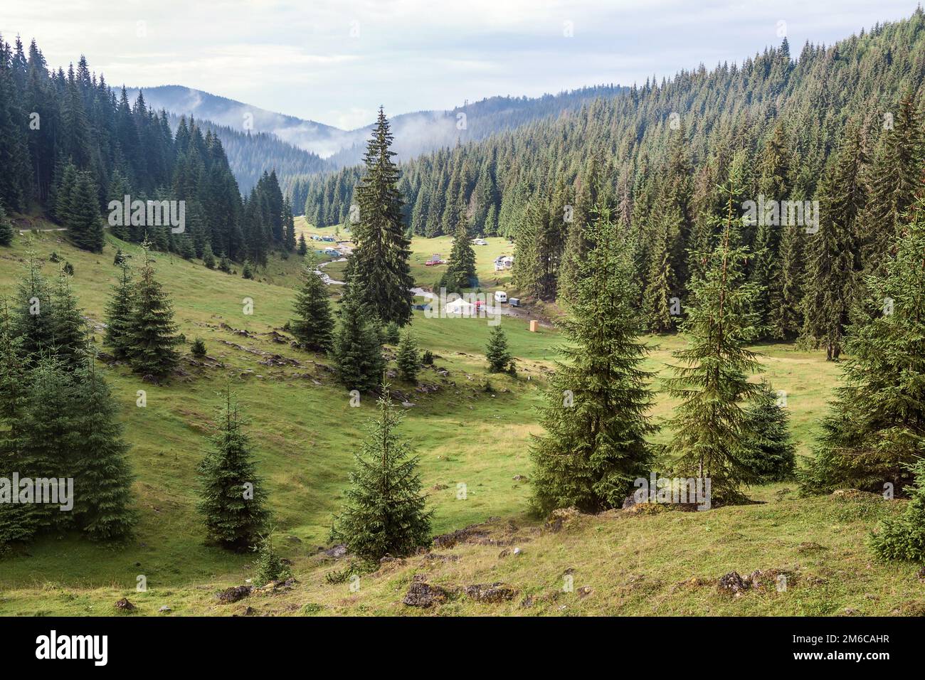Mountain campsite valley Stock Photo - Alamy