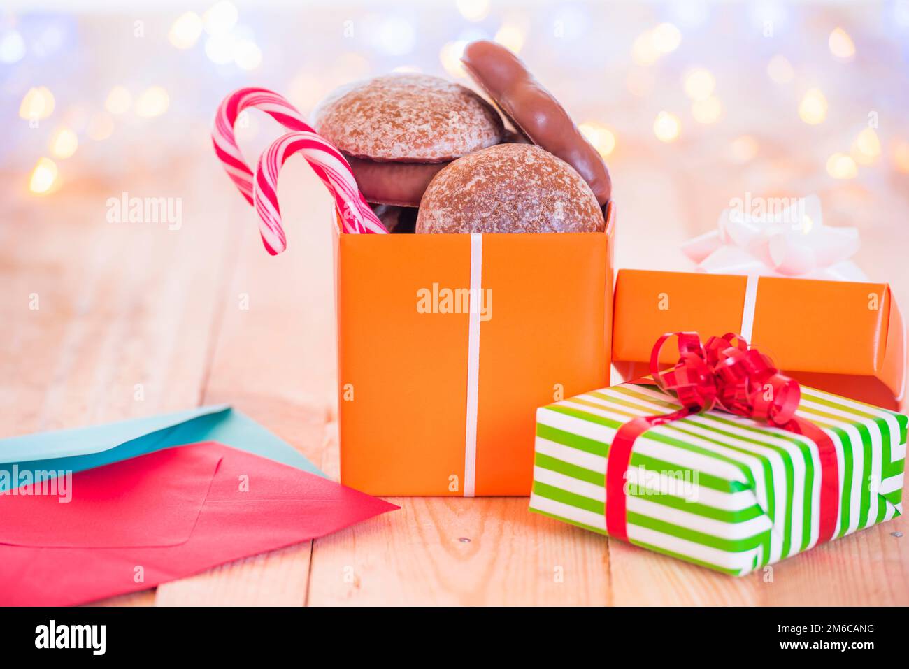 Colorful wrapped presents and letters Stock Photo - Alamy