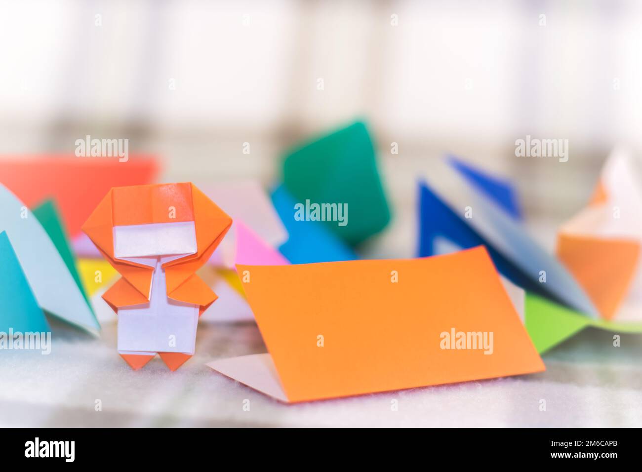 The Little Ninja Kid are Teaching How to Play Origami Stock Photo - Alamy