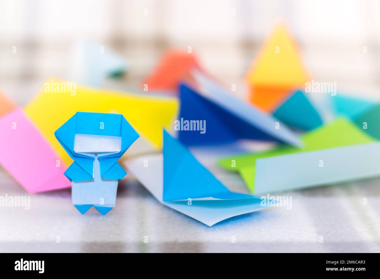 The Little Ninja Kid are Teaching How to Play Origami Stock Photo - Alamy