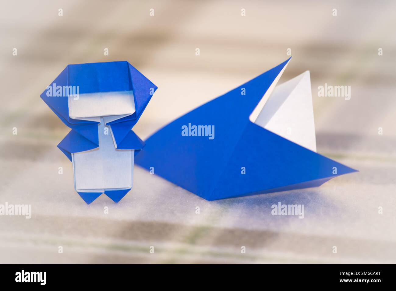 The Little Ninja Kid are Teaching How to Play Origami Stock Photo - Alamy
