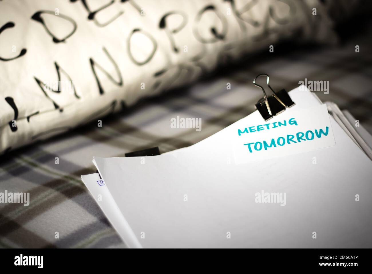 Meeting Tomorrow; Stack of Documents. Working or Studying at Bedroom ...