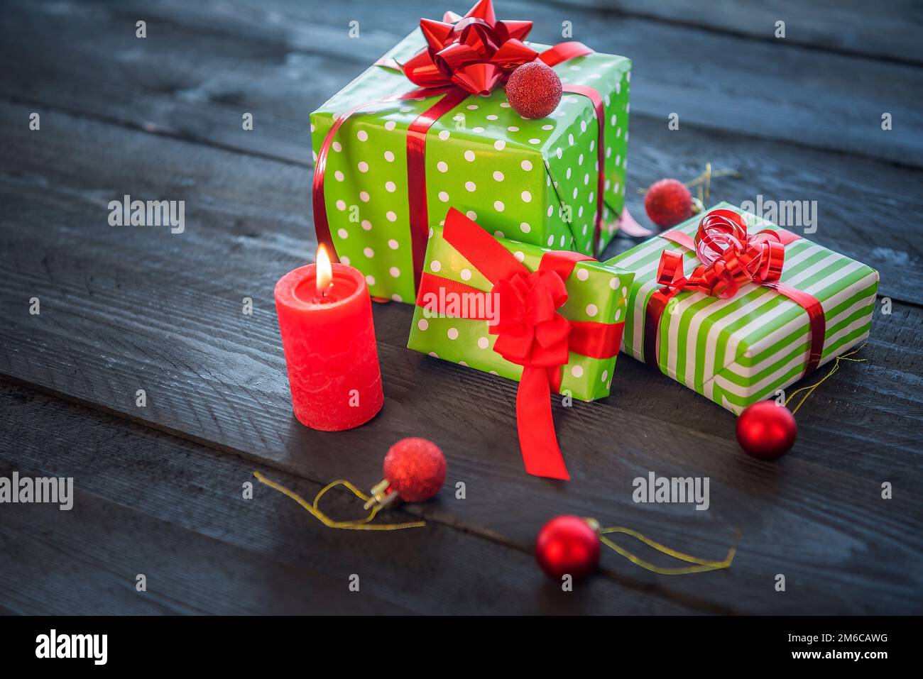 Colorful presents and Christmas ornaments Stock Photo - Alamy