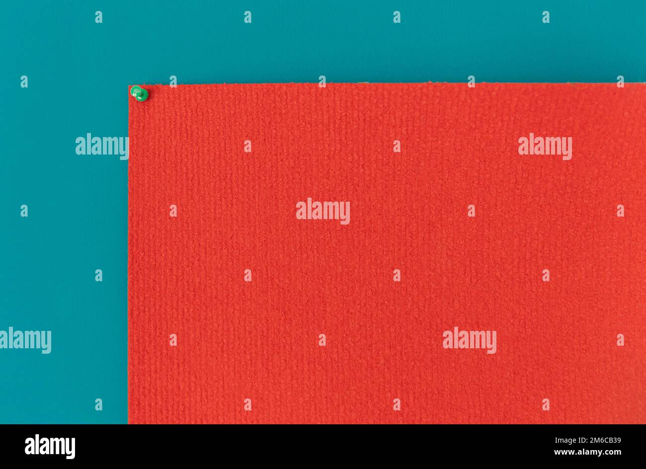 The red carpet is attached with push pins to the wall. Texture. Space ...