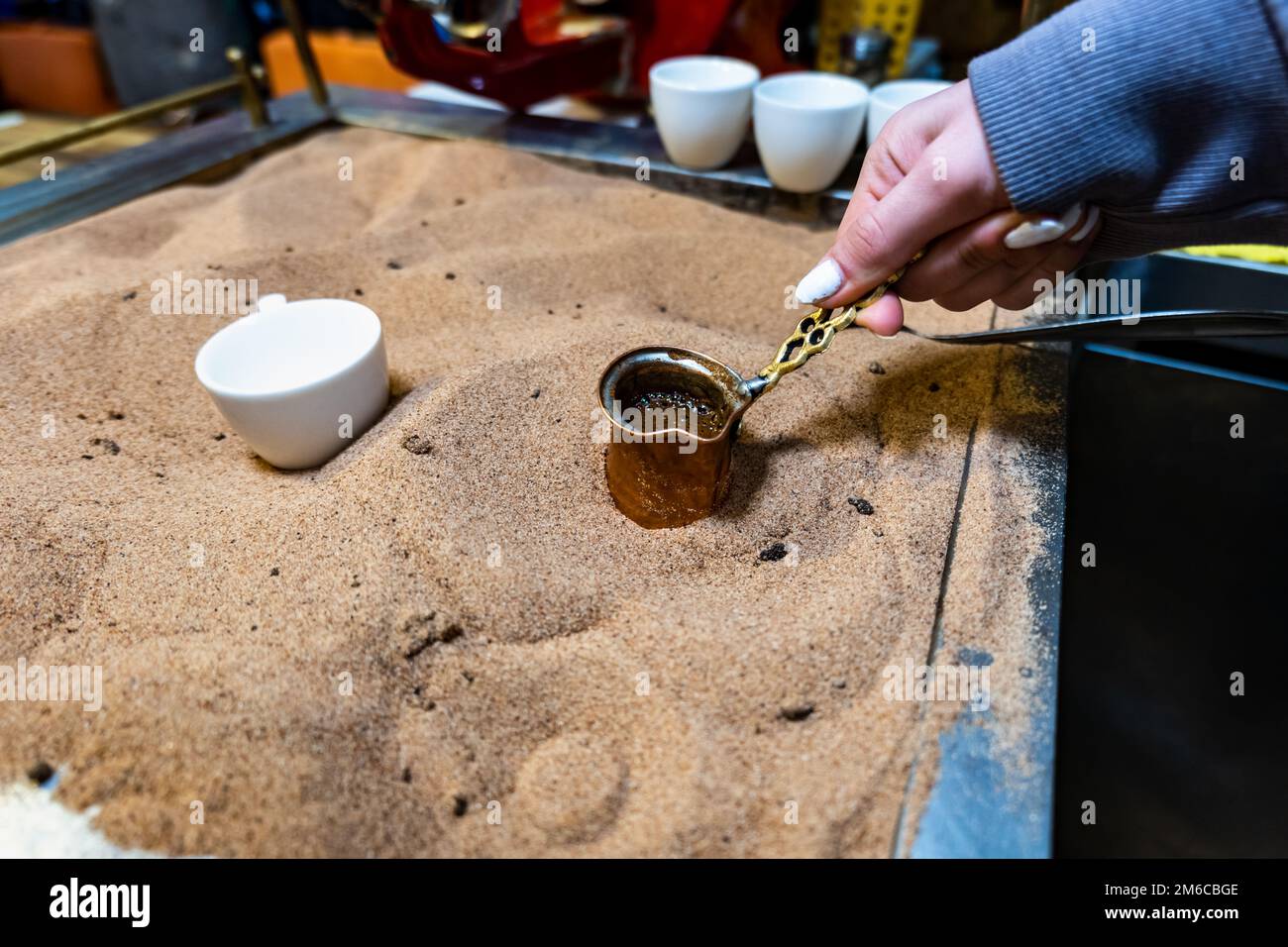 Turkish coffee cooked in sand, Turkish Coffee preparation by street ...