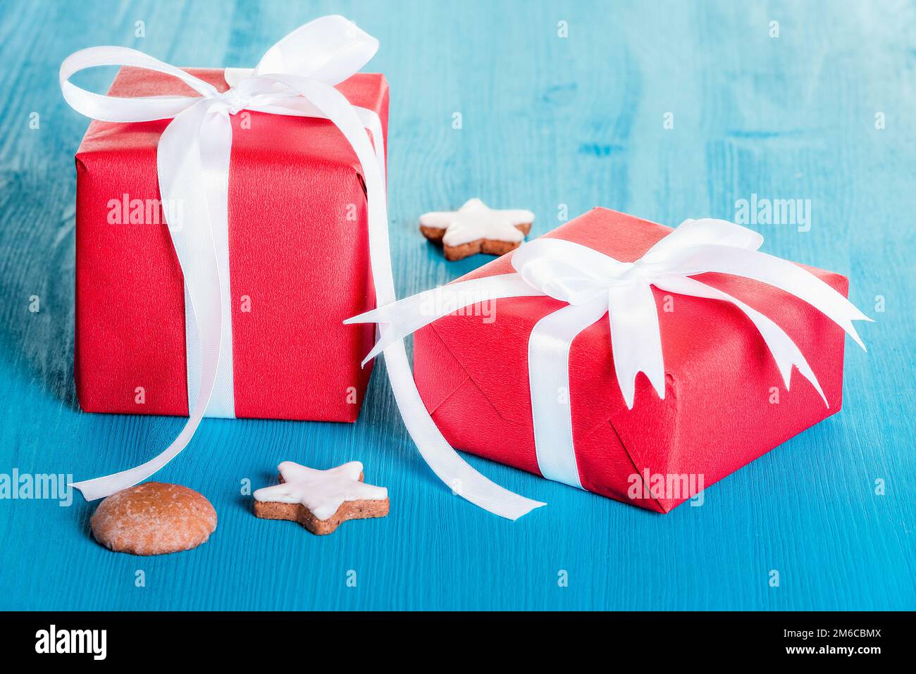 Red wrapped gift boxes Stock Photo - Alamy