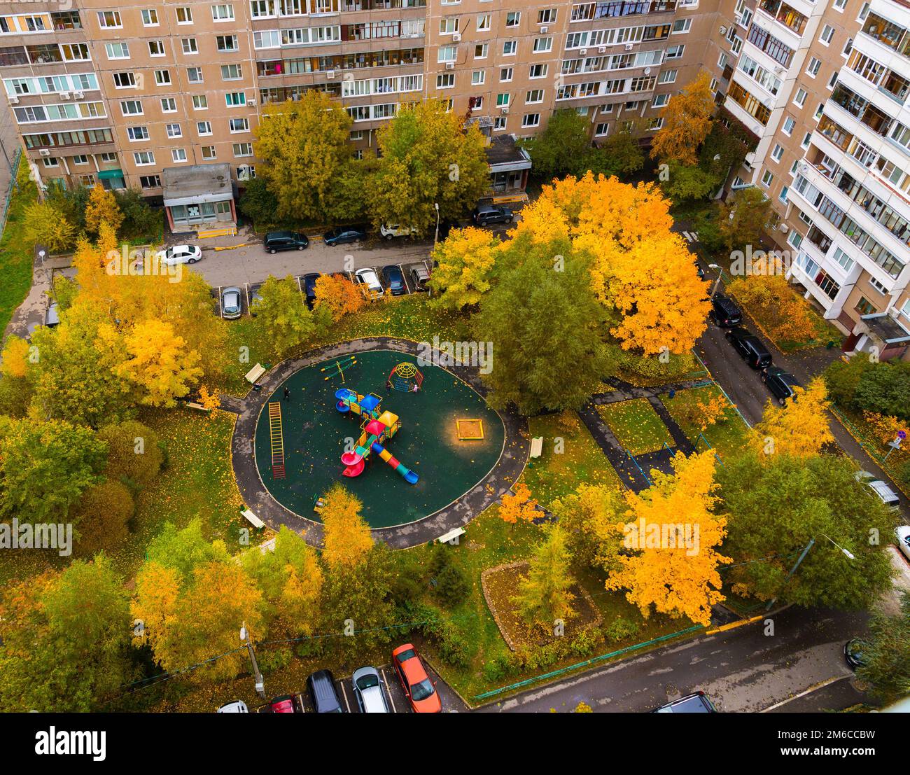 Childrens playground in yard of house in autumn in Moscow, Russia Stock ...