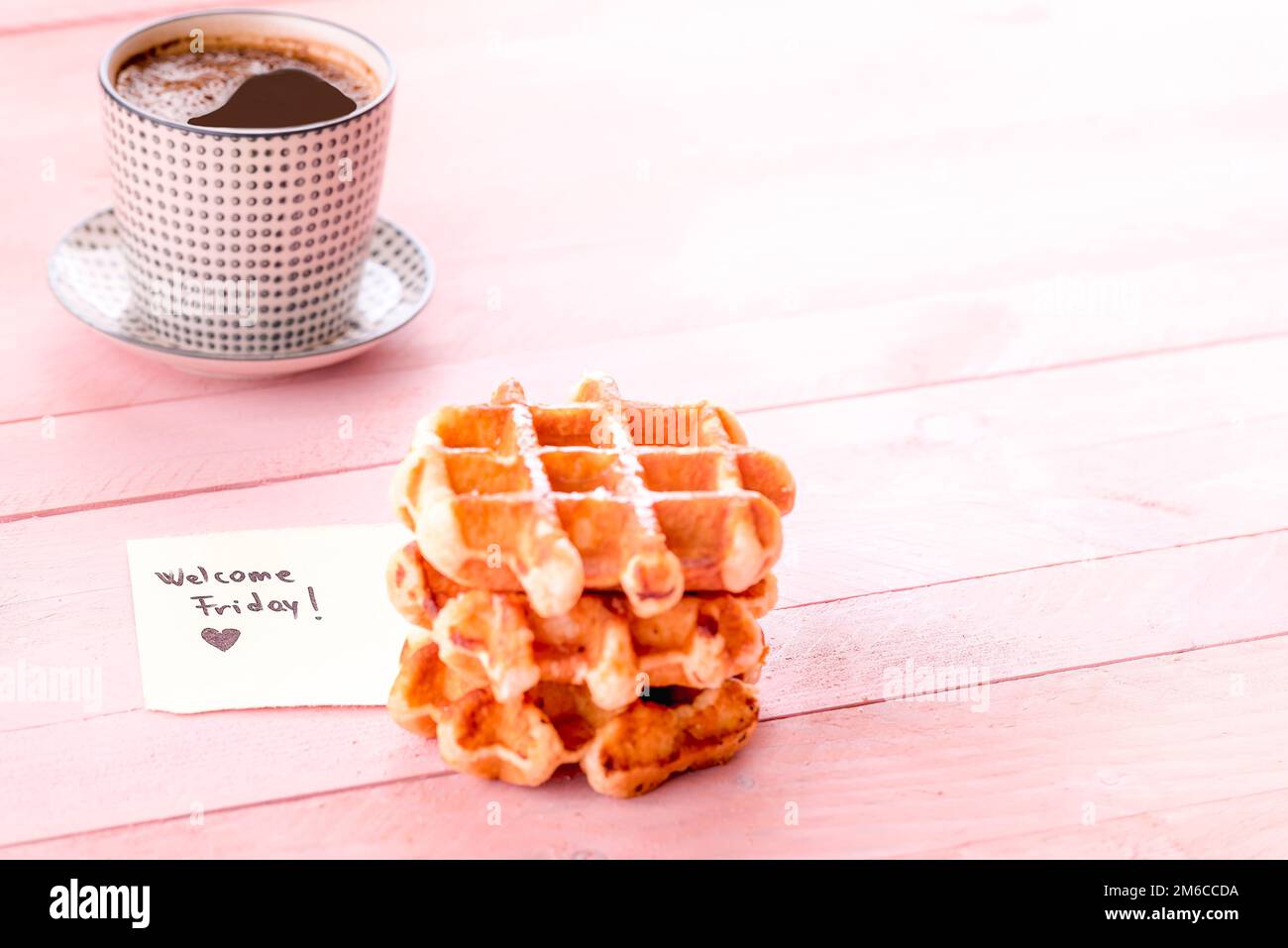 Welcome Friday message and dessert Stock Photo - Alamy