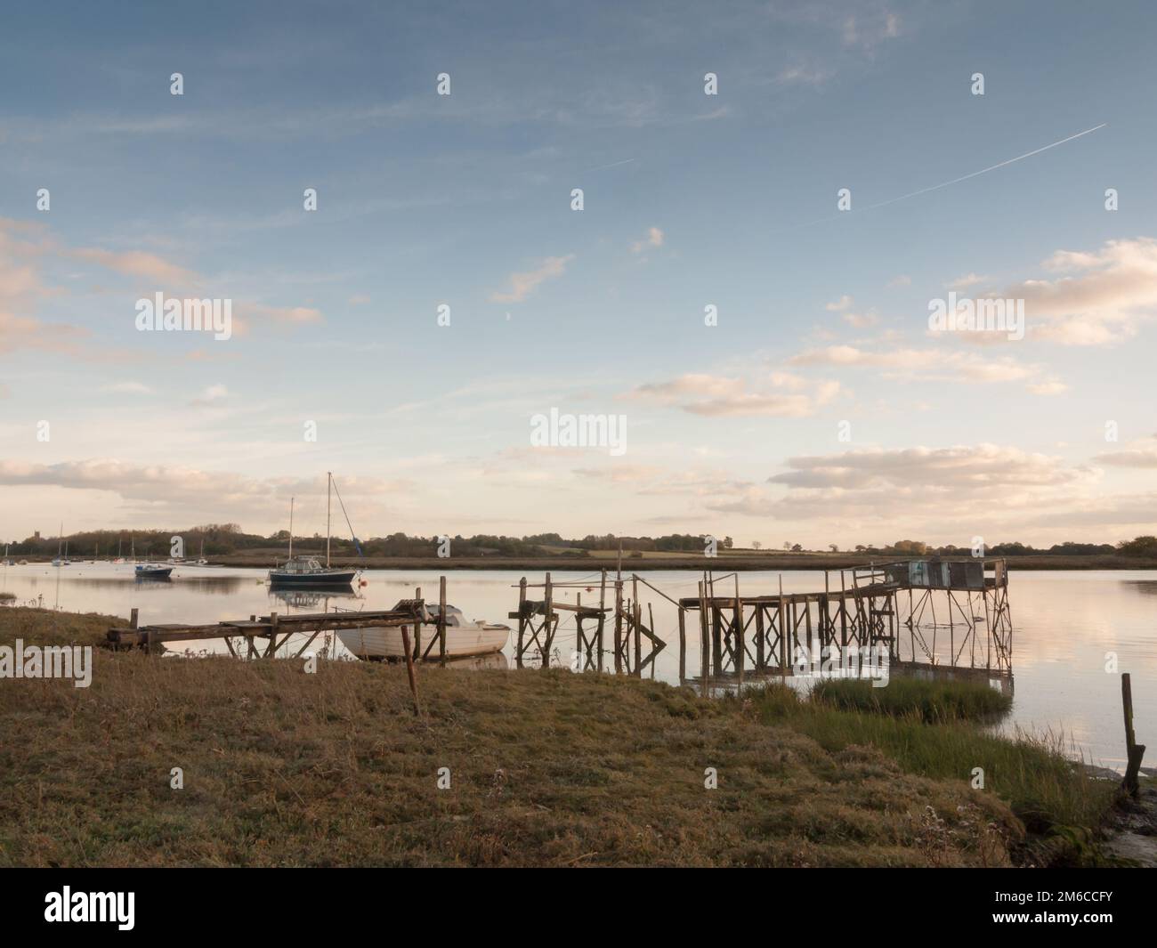 Pier harbour boat jetty scene outside bay coast country river lake ...