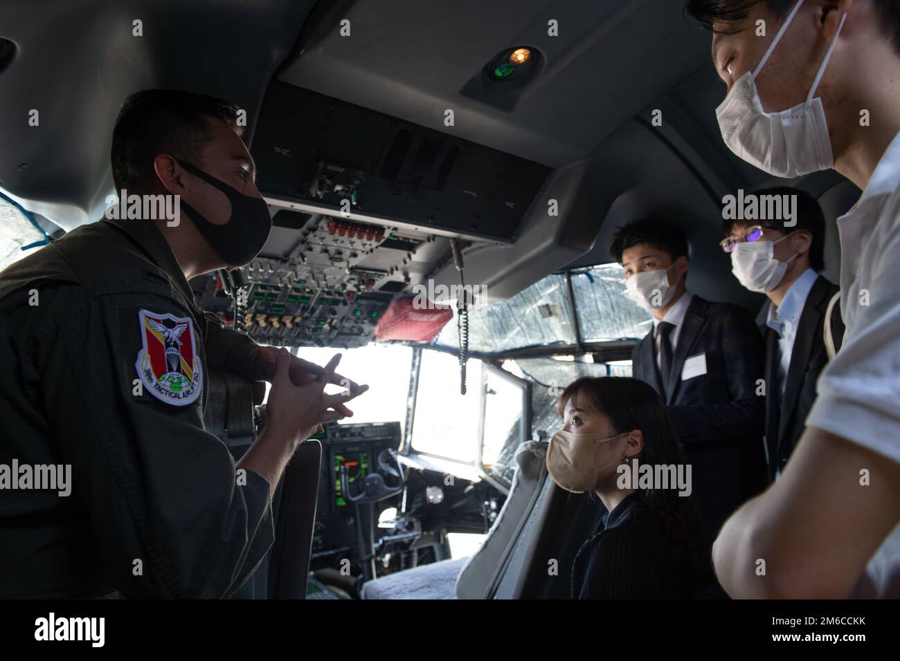 A pilot with the 36th Airlift Squadron, 1st Lt. Kevin Mendez, left ...