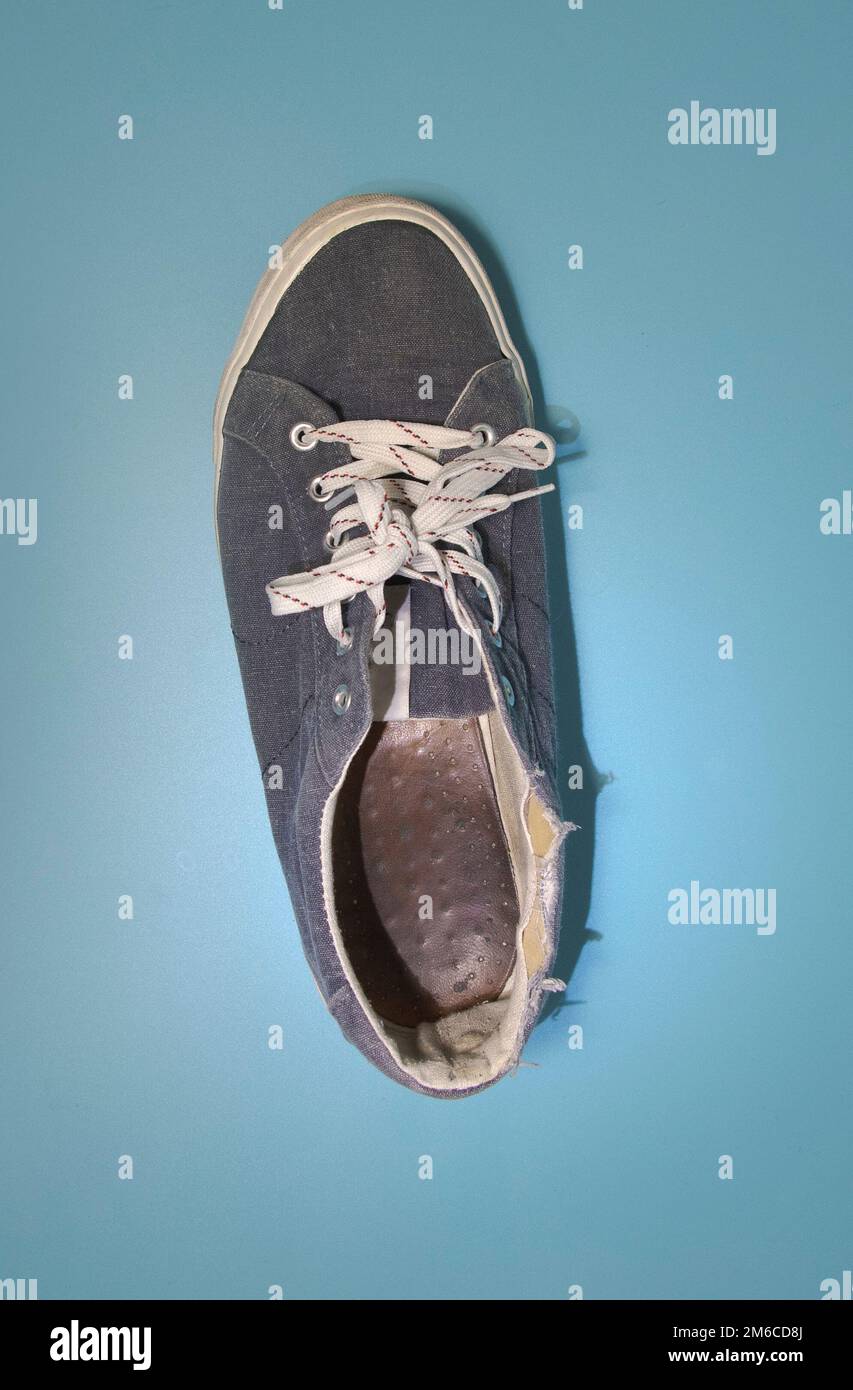 Torn running shoe hi-res stock photography and images - Alamy