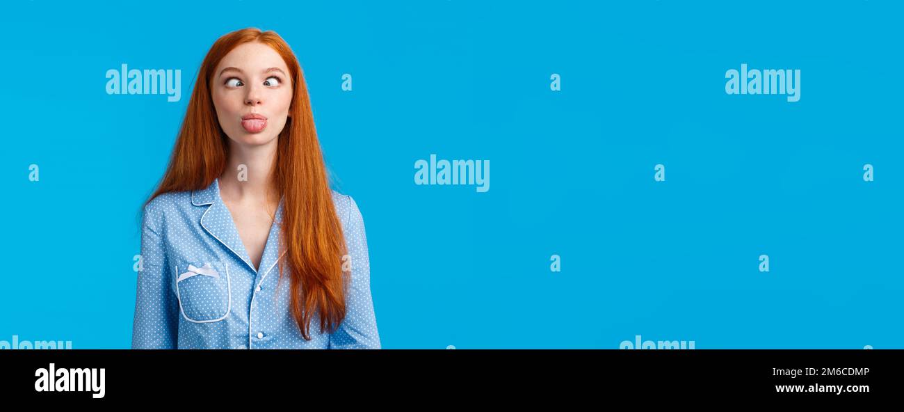 Be funny and silly. Redhead carefree and enthusiastic caucasian girl ...