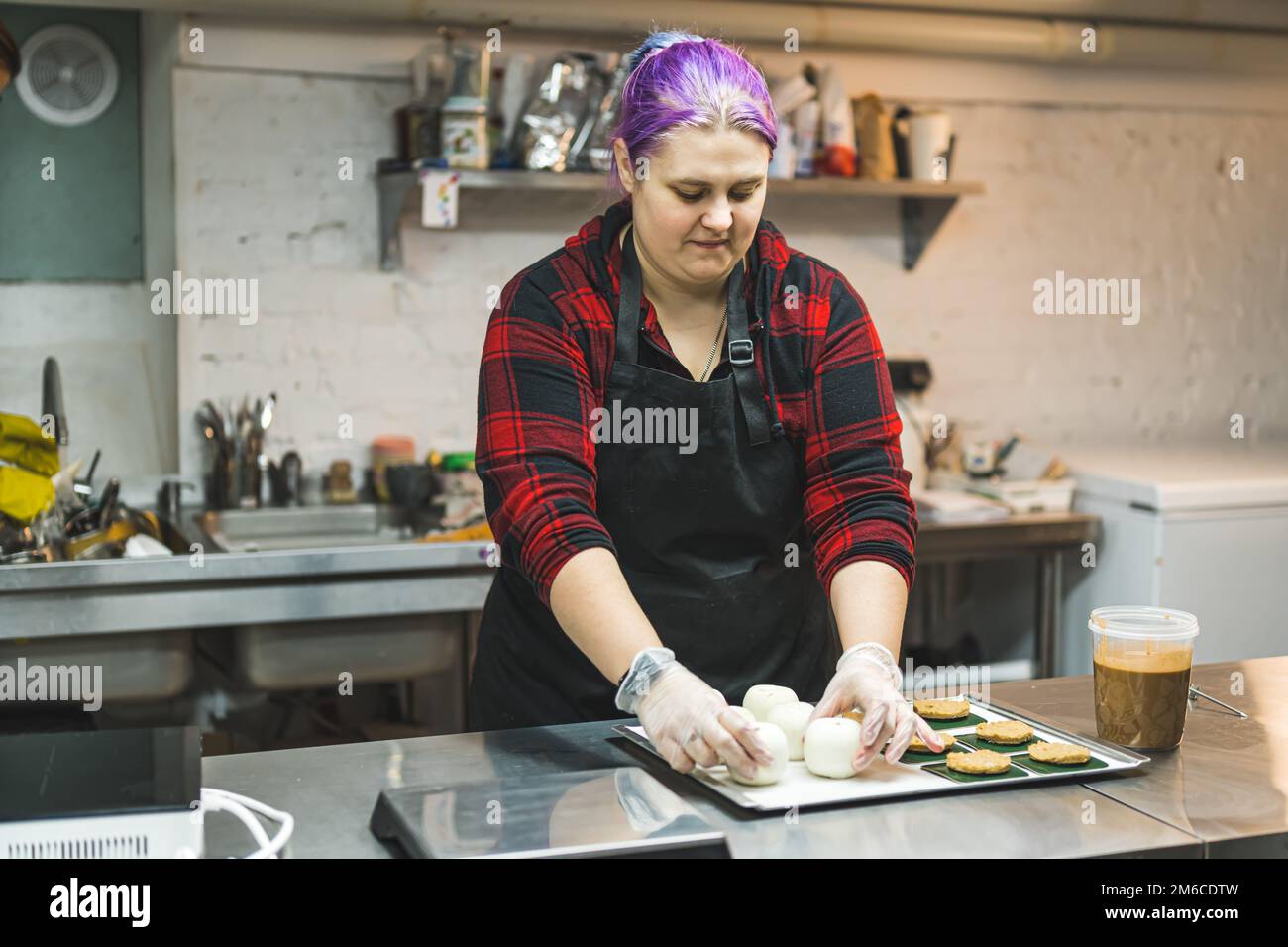 Fat woman tray of cakes hi-res stock photography and images - Alamy
