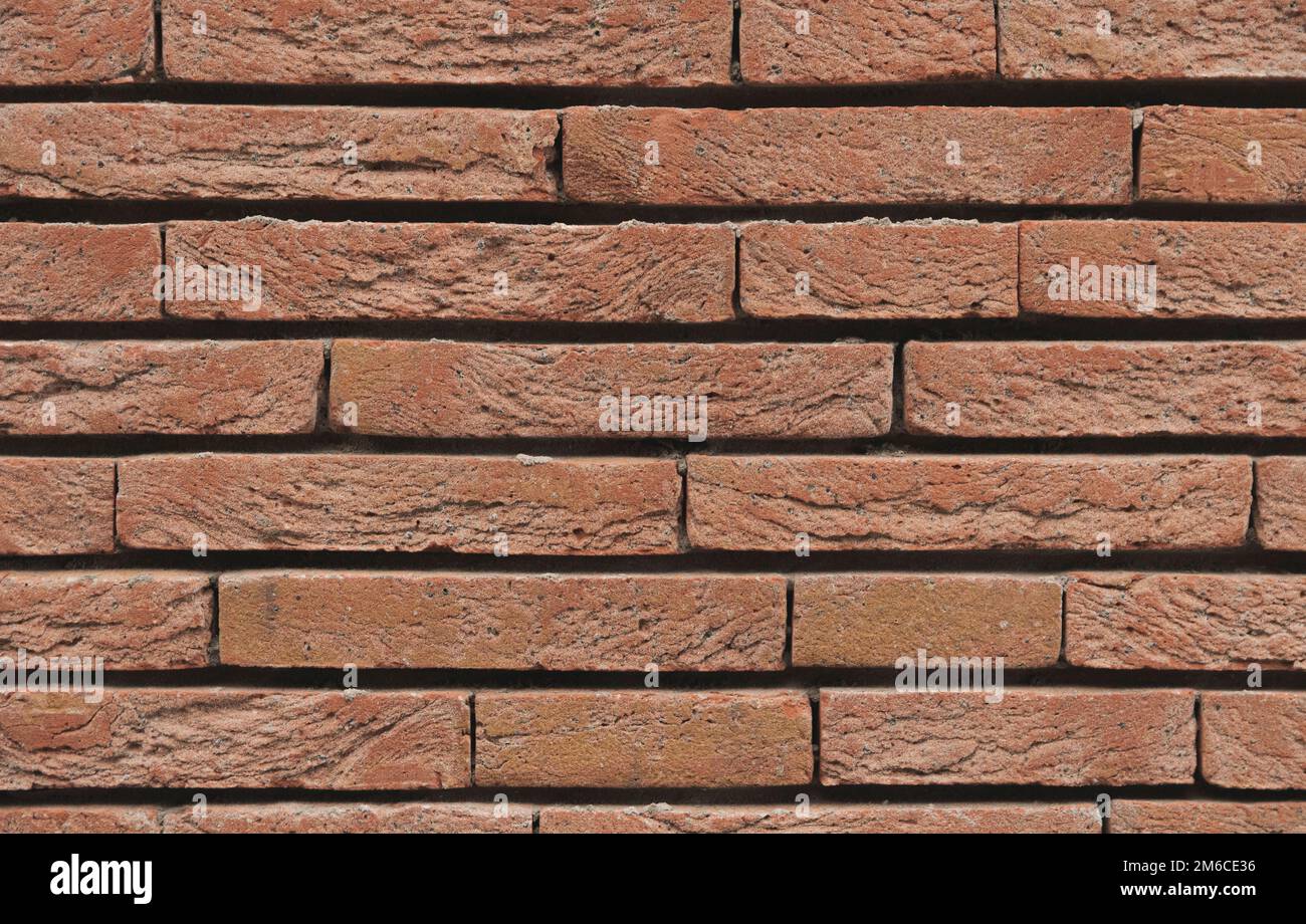 Thin red brick brickwork texture Stock Photo - Alamy