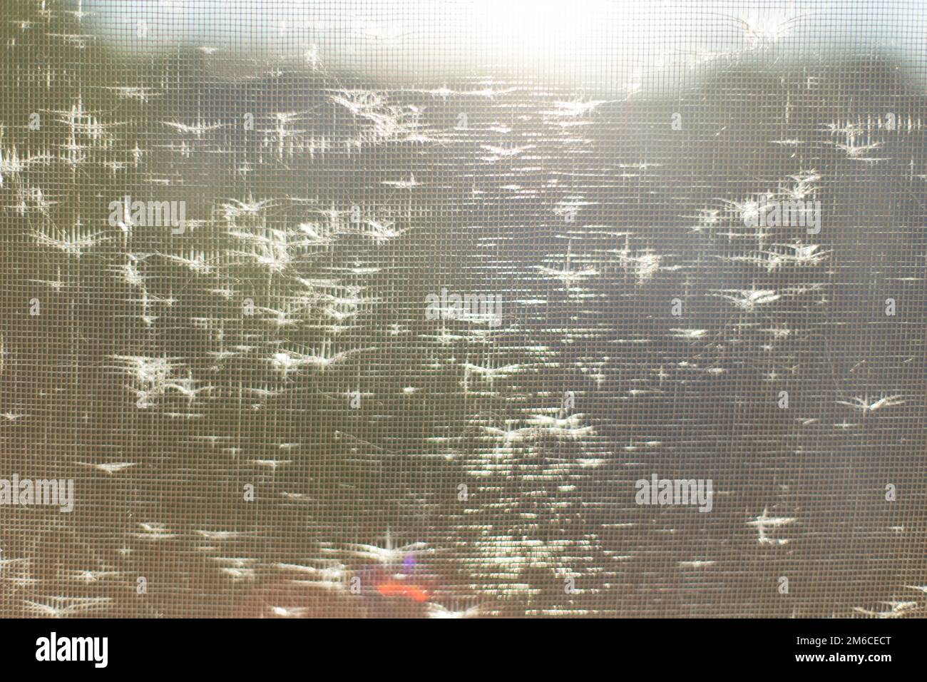 Sunlight on masked grid. Texture of bright rays Stock Photo - Alamy