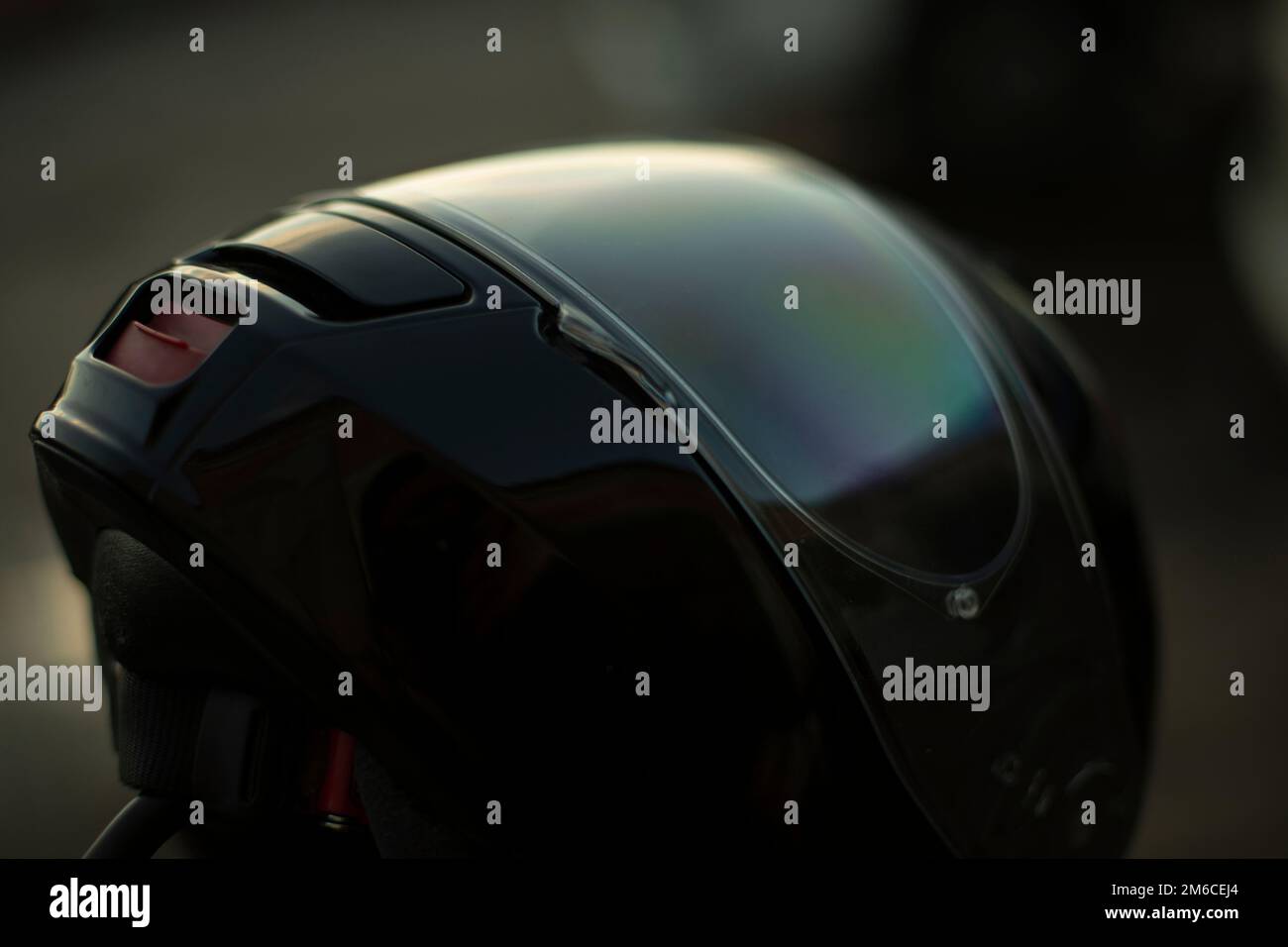 Black motorcyclist helmet. Biker head protection. Safety on road Stock ...