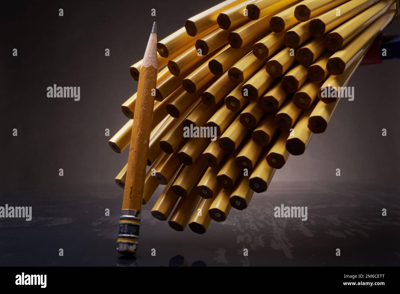 Cascading new pencils in concert with a sharpened one Stock Photo - Alamy
