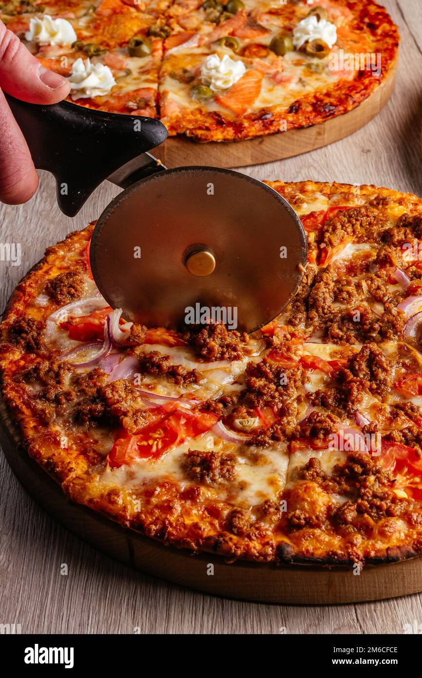 Top view mans hand cutting hi-res stock photography and images - Alamy