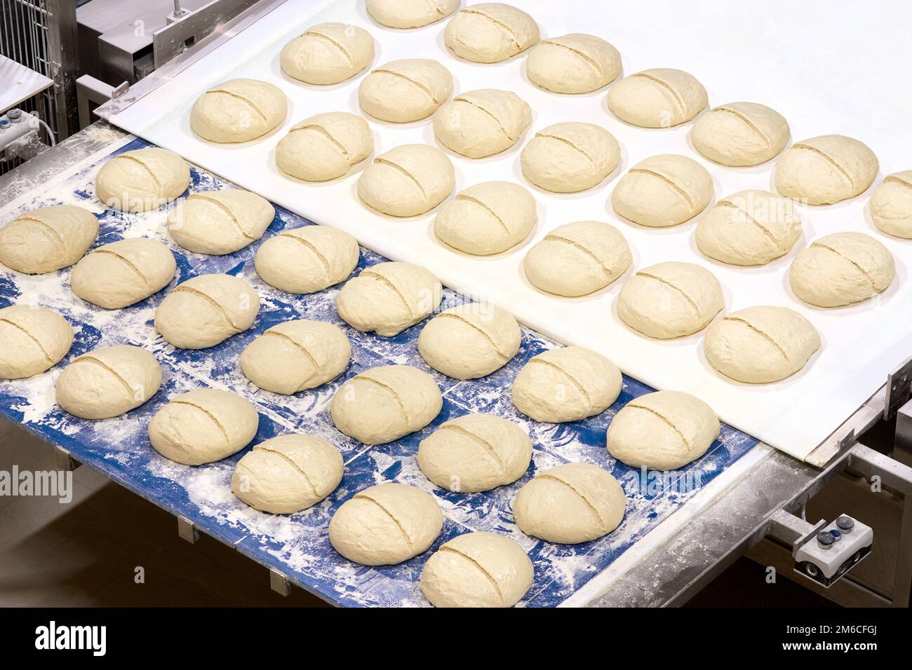 Starting industrial bread process Stock Photo - Alamy