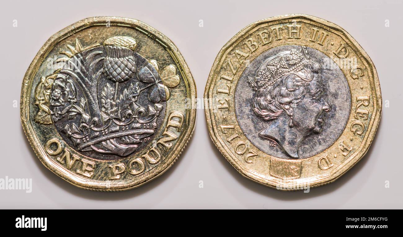 Close up focus photos of new United kingdom Pound coin isolated on a ...