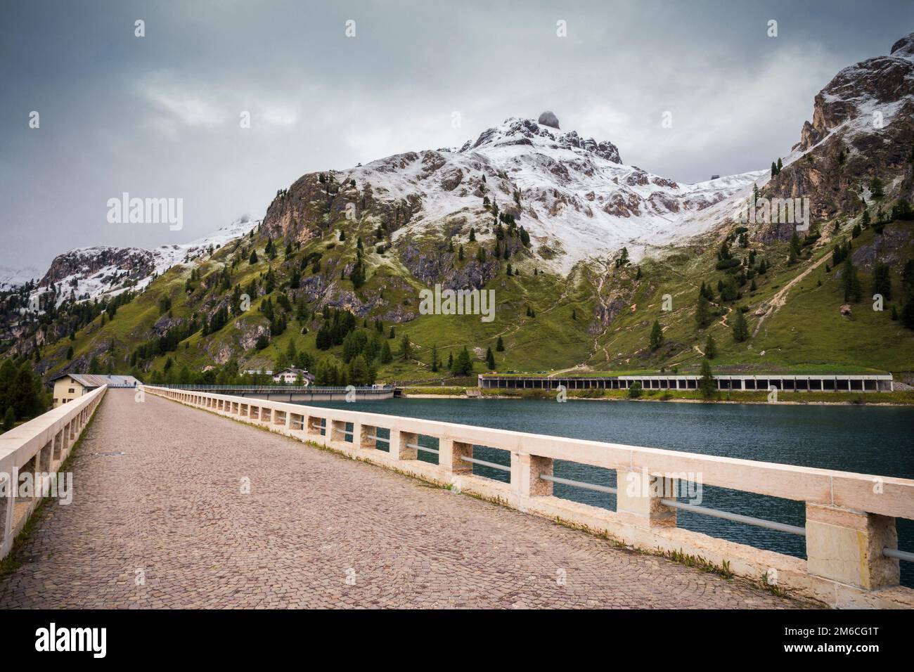On the dam of Fedaia Lake Stock Photo - Alamy