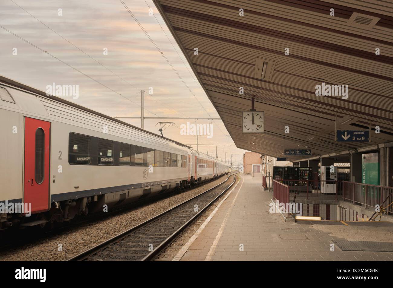 Hasselt, Limburg - Belgium - 12/24/2020. Waiting for the train to arrive at the Belgium train ...