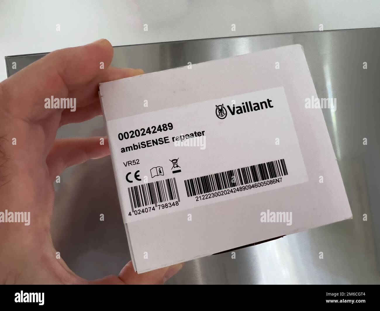 London, United Kingdom - Jan 1, 2022: POV male hand holding new ...