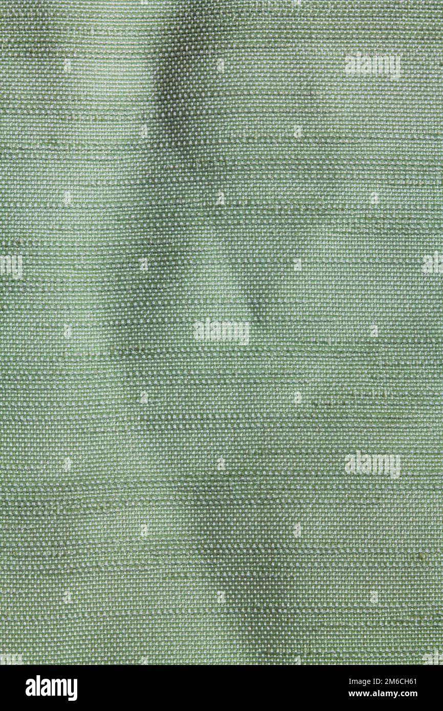 Texture of green fabric made of polyester Stock Photo - Alamy