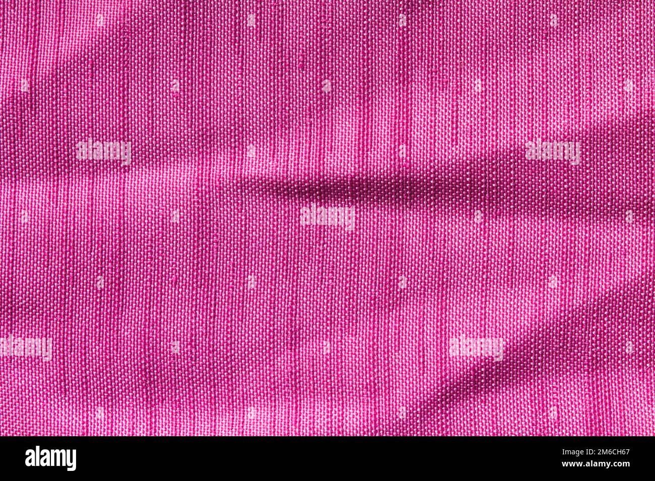 Texture of pink fabric of polyester Stock Photo - Alamy