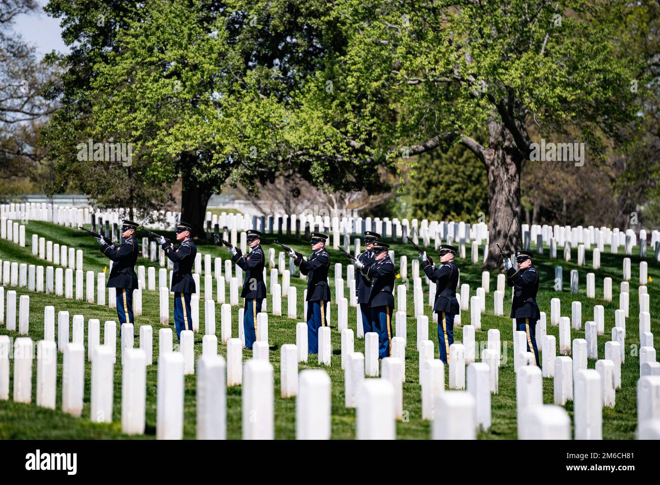 A firing party from the 3d U.S. Infantry Regiment (The Old Guard) fires ...