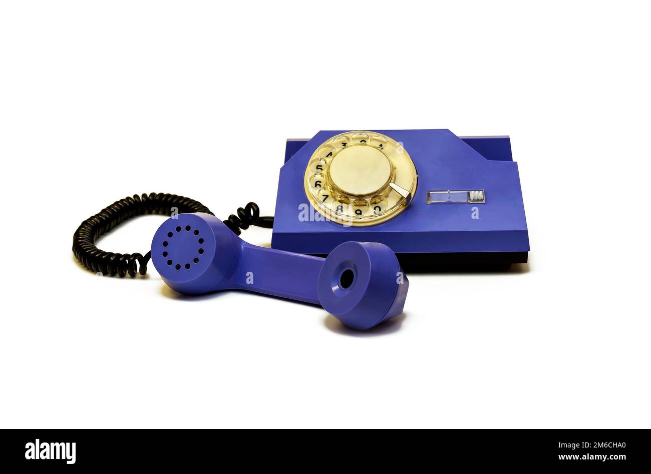 On a white background is a retro telephone with a round dialer Stock ...